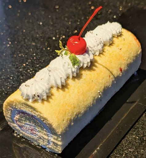 Classic Vanilla Swiss Roll Cake With Cherry And Whipped Cream Stock