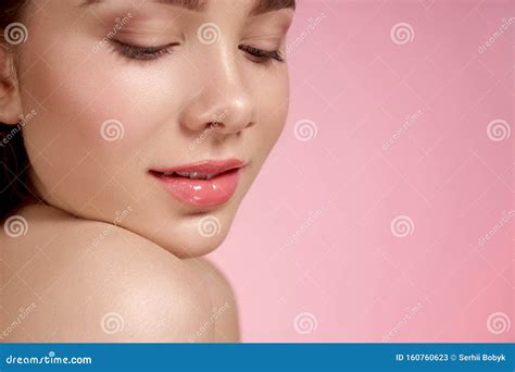 Closeup Of Lovely Young Girl With Natural Nude Makeup Posing Stock