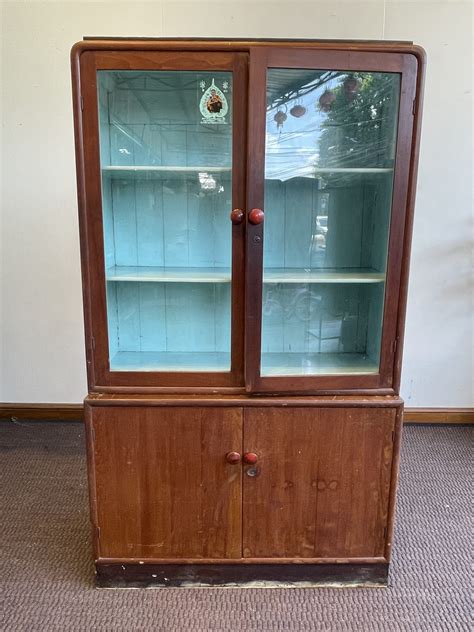 ตู้โชว์ 2 บานเปิดกระจก 2 บานเปิดทึบ โครงไม้สักปิดหลังไม้อัด 777 เฟอร์นิเจอร์ เฟอร์นิเจอร์