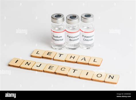 Medical Vials With A Label Reading The Names Of Lethal Injection Drugs And A Sign Reading Lethal
