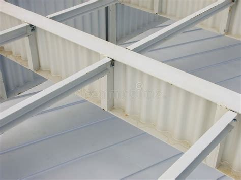 Construction Site Showcasing The Steel Roof Framework Of A New