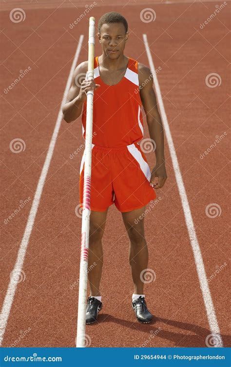 Male Pole Dancer With Body Art On Pylon Stock Image