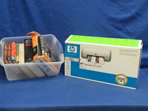 hp deskjet d1341 printer turns on and some books aaa auction and realty