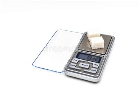A Sugar Cube Lies On A Small Scale Stock Image Image Of Control Carbohydrate 273940315