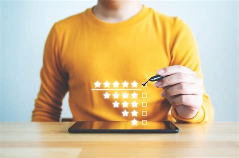 Premium Photo Hand Of Man Touching Icon Five Star Symbol To Increase