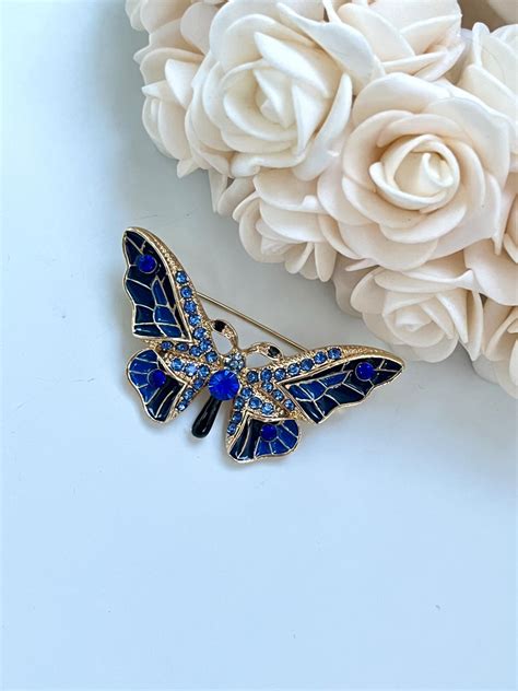 Broszka motyl szmaragd granat złoto MaggiaArt