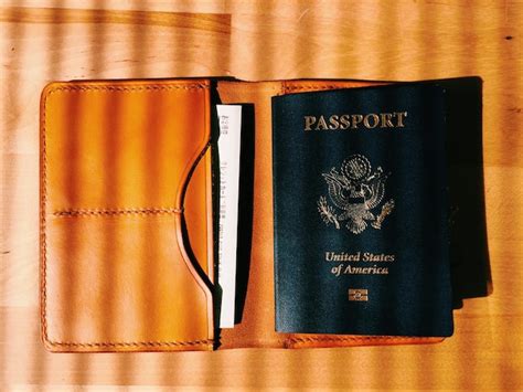 Premium Photo High Angle View Of Passport On Table