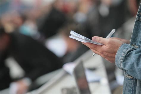 Reporter Taking Notes