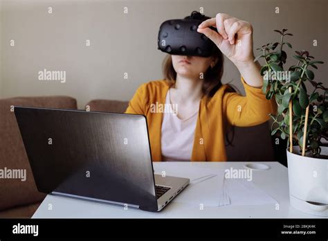 The Girl Communicates With Friends Using Augmented Reality In Focus Is
