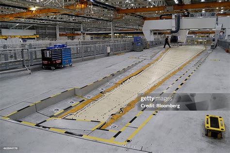 A Section Of An Airbus A350 Wing Sits In A Jig As An Automated News