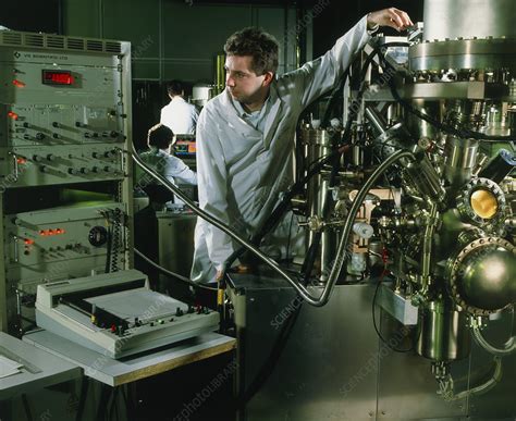 Scientist Using A High Resolution Spectrometer Stock Image T875
