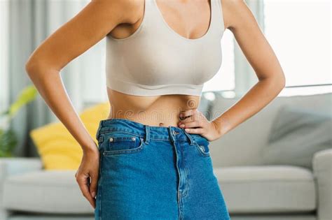 Unrecognizable Young Lady Doing Stomach Vacuum Exercise Flexing