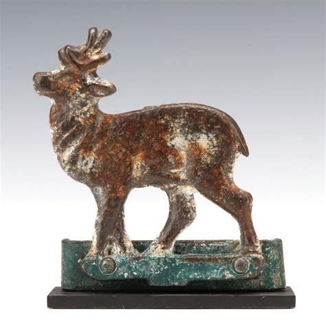 91 a figural cast iron deer shooting gallery target