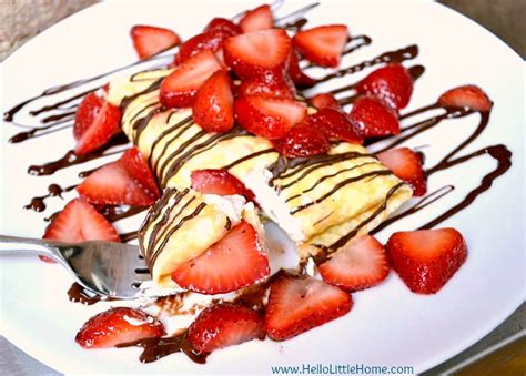 Strawberry And Cream Crepes With Chocolate Sauce