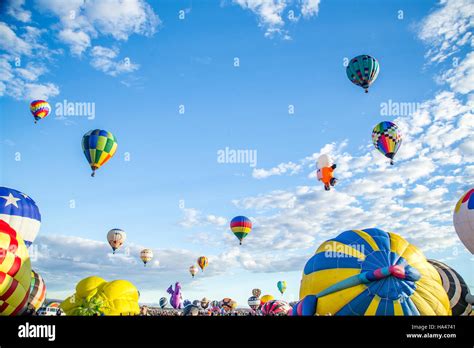 Hot Air Balloons Fly Over The City Of Albuquerque New Mexico During