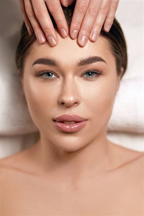Face Massage Close Up Of Young Woman Getting Spa Massage T Stock Image