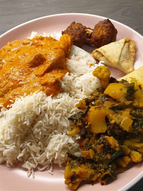 Homemade Indian Food Aloo Gobi Saag And Chicken Makhani Rfood
