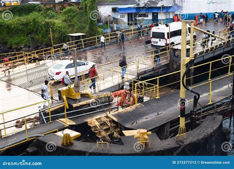 Passengers Disembarking From The Ferry Boat At The Terminal Editorial
