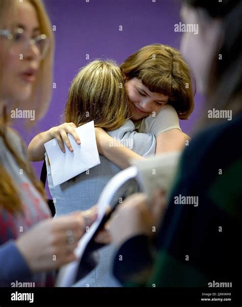 Students Congratulate Each Other Receiving Their GCSE Results At