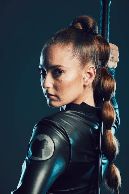 Premium Photo Woman Warrior And Vigilante In Cosplay With Sword Ready