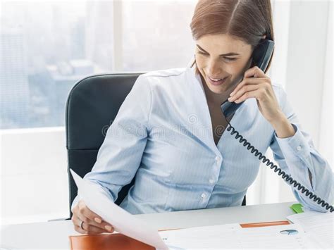 Business Executive Working In The Office And Making Phone Calls Stock