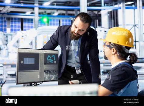 Photovoltaics Factory Coworkers Doing Brainstorming Finetuning System