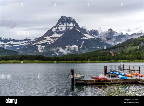 Boat Launch At Swiftcurrent Lake A U S Flag Flying Above Boat Launch