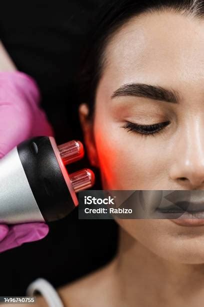 Radio Frequency Lifting With Red Light For Young Woman Closeup