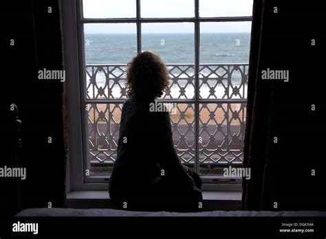 Woman Sad Looking Out Window