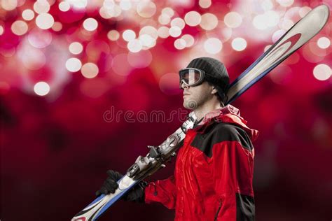 Skier Holding A Pair Of Skis Stock Photo Image Of Mountain