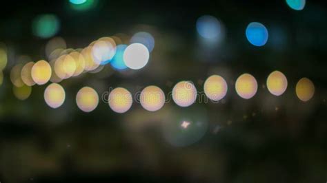 A Blurred Background Featuring The Bright Circles Light Of The