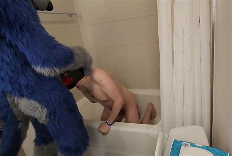 Fursuit Pees On Pup Hood