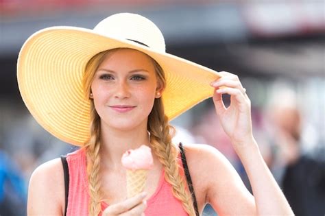 Premium Photo Woman Looking Away While Having Ice Cream