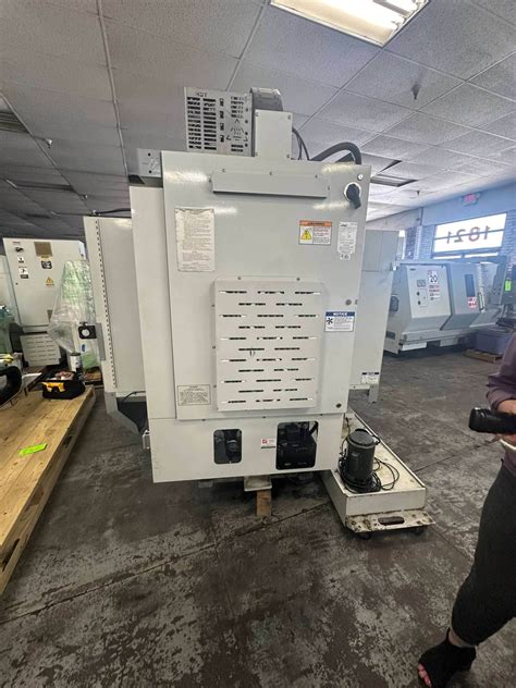 Haas VF 2D VMC 2006 20 HP Vector Dual Drive Auger Revelation