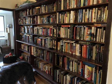 This Wall Of Bookshelves In The Living Room Was The Reason I Bought My