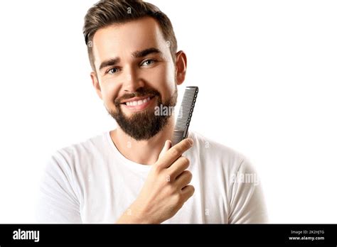 Handsome Well Groomed Man Combing His Beard Stock Photo Alamy