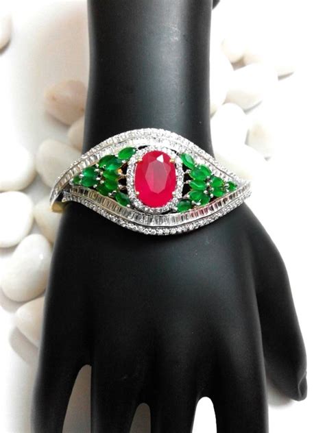 Stylish Ruby Emerald Braclet With Americian Diamond Rich Look 336059