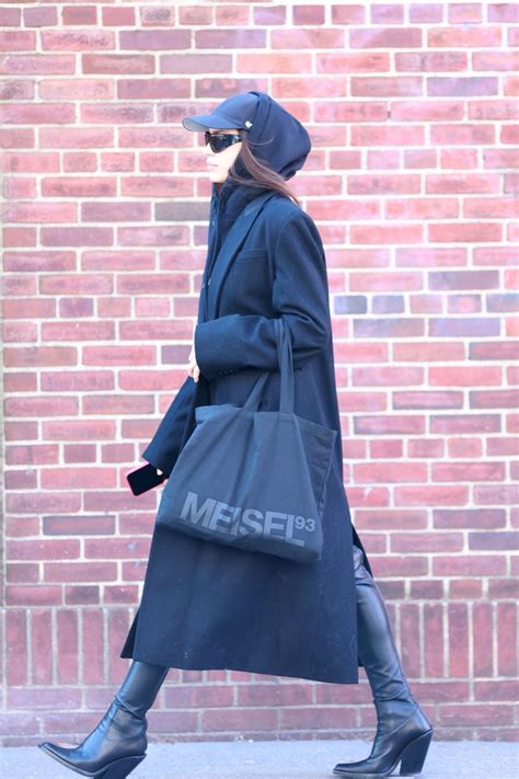 Irina Shayk Wearing Fashionable Black Getup Pairing Leather Boots With
