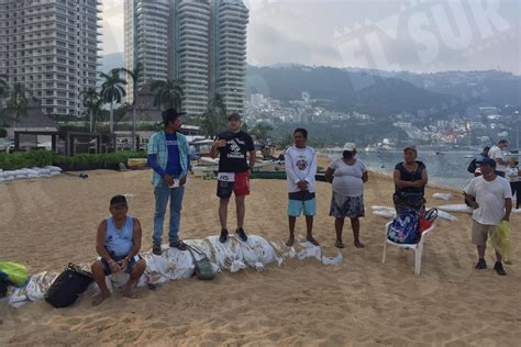 Realizan Limpieza En Playa Icacos Contra La Privatización Y