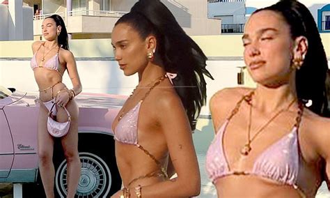 Dua Lipa Poses In A Sparkly Light Purple Two Piece As She Poses For