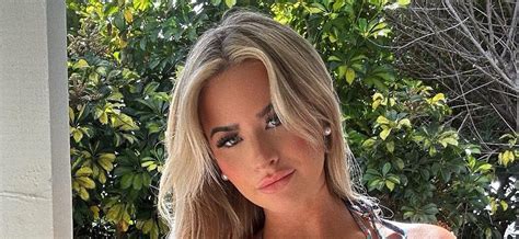 Emily Elizabeth Shows Major Spillage In Her Tiny Black Bikini