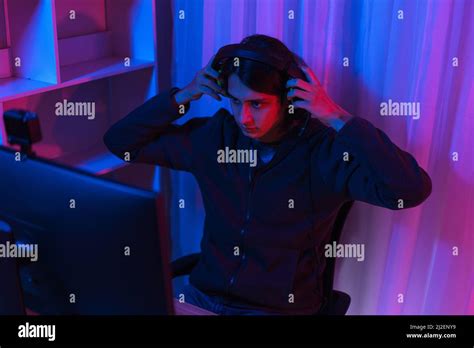 Game Stream Concept Male Streamer Wear Headset To Watching Games