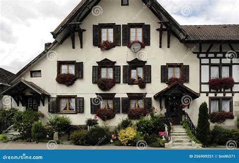 Cartoon Picture Of A Traditional German House Ornated With Flowers