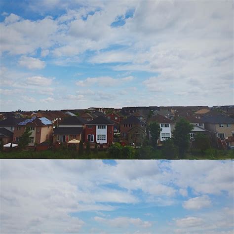 Premium Photo Buildings Against Cloudy Sky
