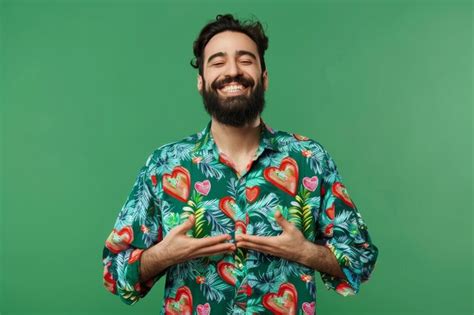 Premium Photo A Photo Of A Smiling Arabian Man Rocking Floral Shirt