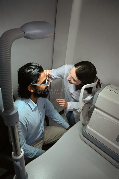 Ophthalmologist Checking Eye Vision Of Patient For Appropriate
