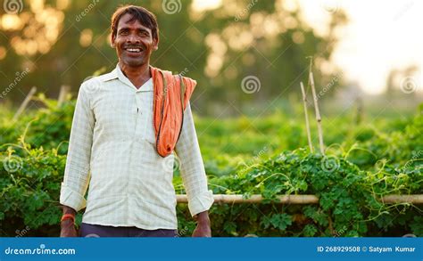 Beautiful Dramatic Portrait Of Indian Rural Happy Farmer Standing In