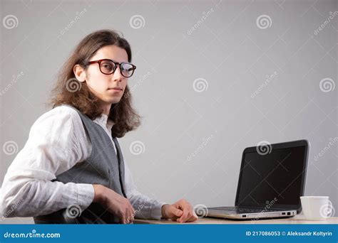 Programming And Application Development A Young Man Writes Code