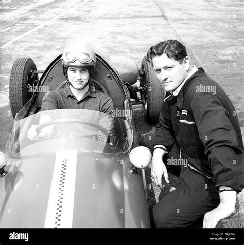 1962 Historical A Young Male Driver Sitting In A Cooper Motor Racing