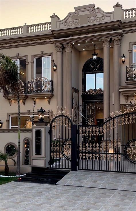 Luxurious Classical Villa With Iron Gate And Palm Trees